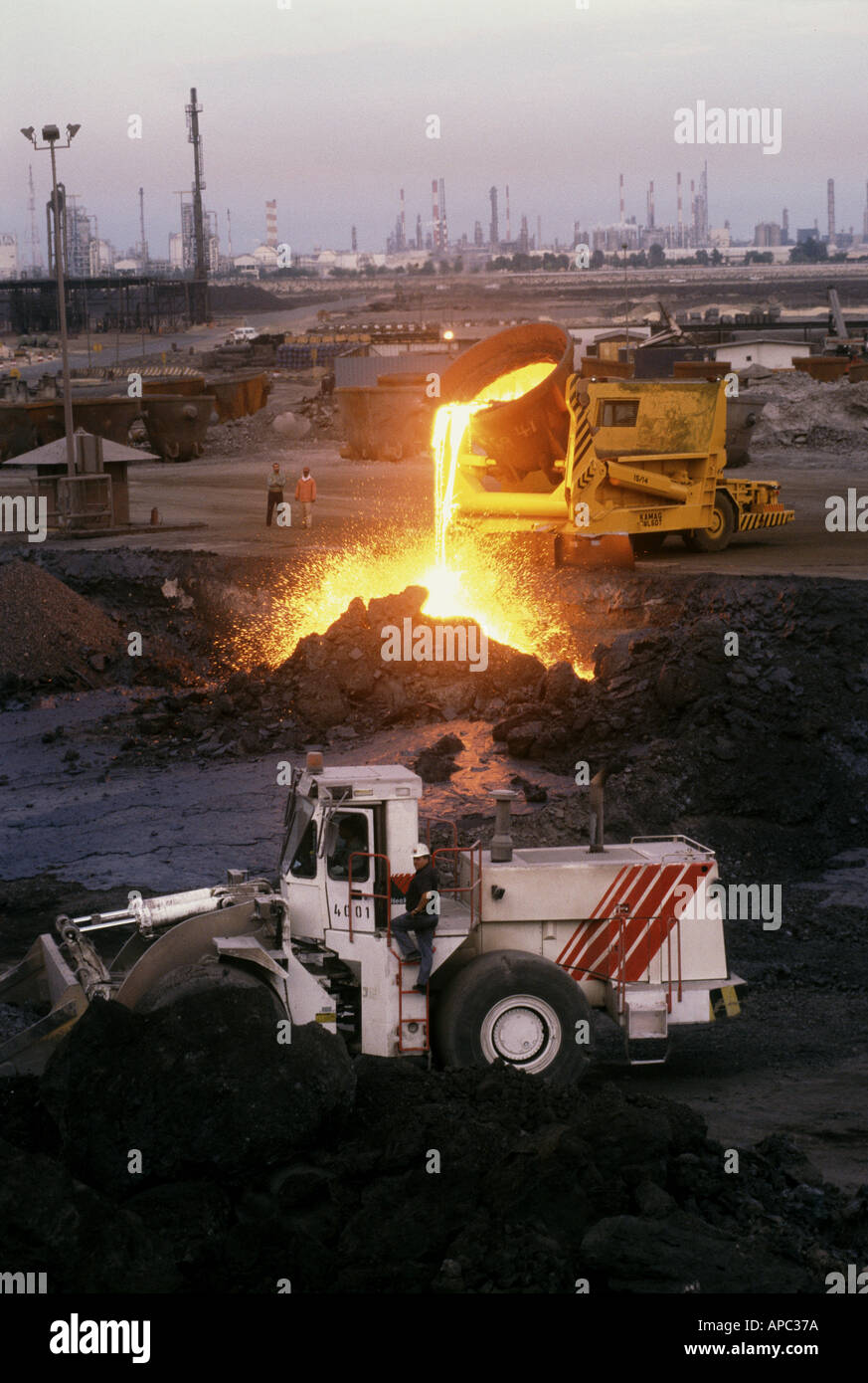 Refuse molten steel or slag being poured at steel plant in industrial ...