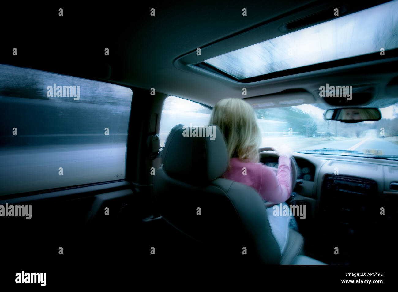 Girl Driver Back in Car 1 Stock Photo - Alamy