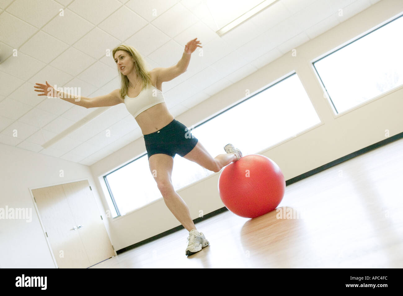 Woman ball lunge balance hi-res stock photography and images - Alamy