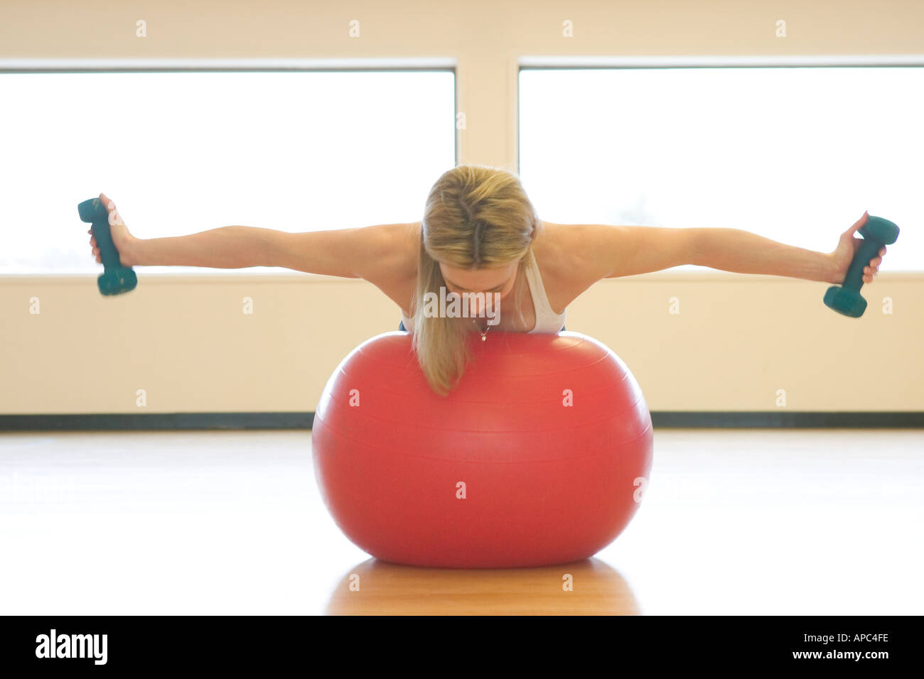Woman and Red Exercise Ball 10 Stock Photo - Alamy
