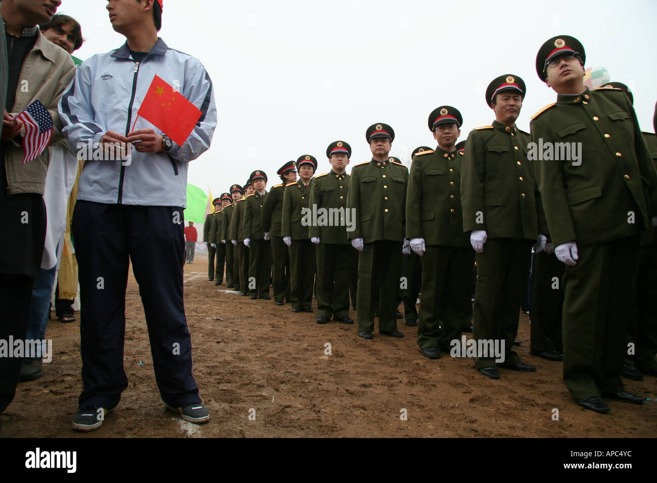 Members of People's Liberation Army (PLB) stand in line during the ...