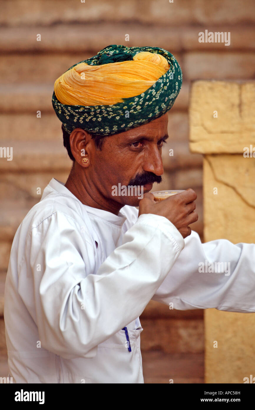Indian man with turban drinking tea Stock Photo - Alamy