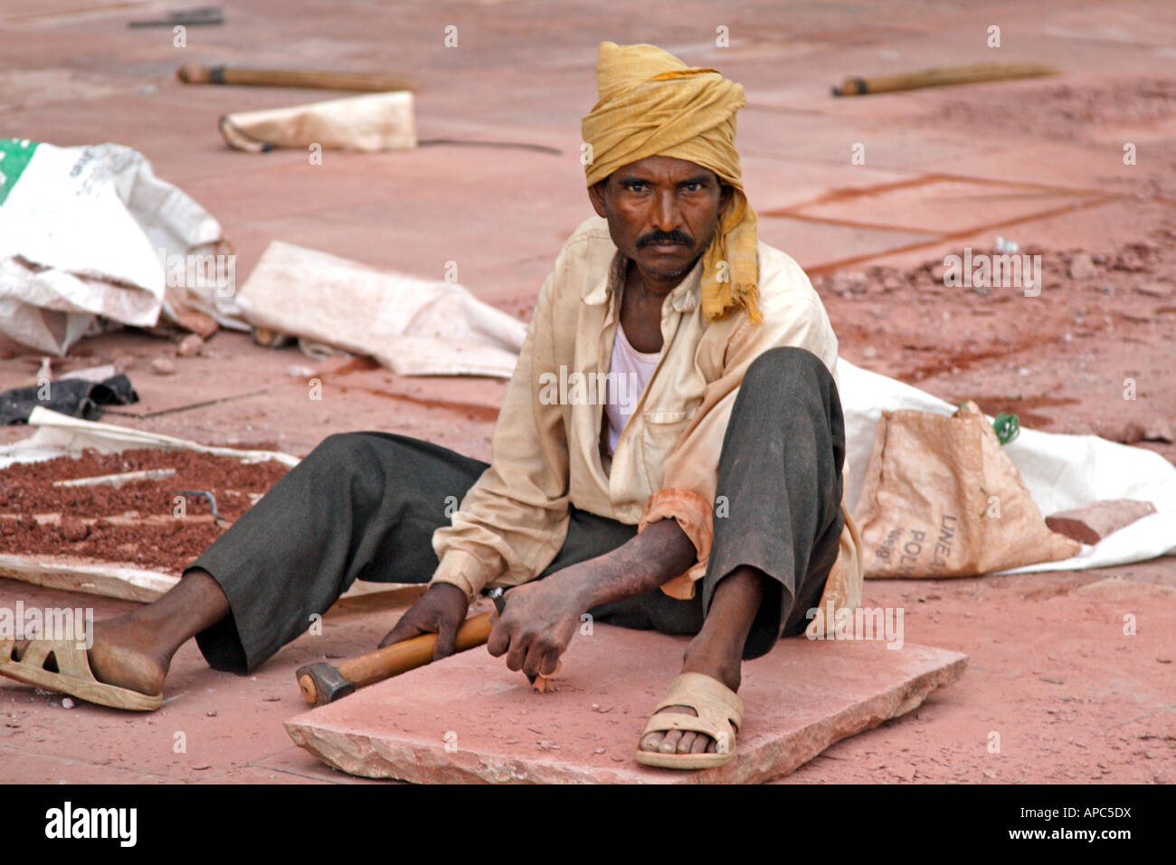 Portrait of a working Indian tradesman Stock Photo - Alamy