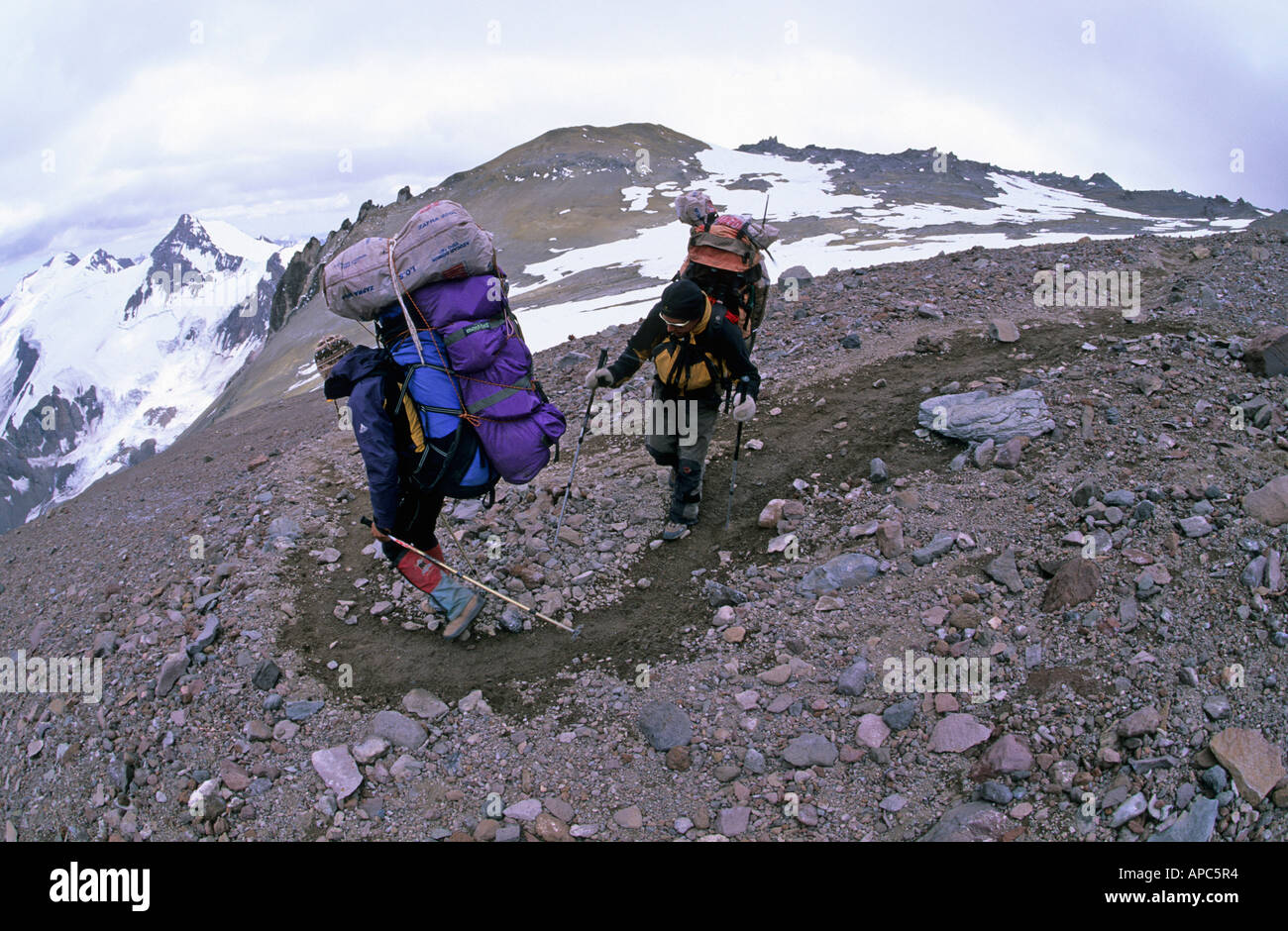 Two men carrying sticks hi-res stock photography and images - Alamy