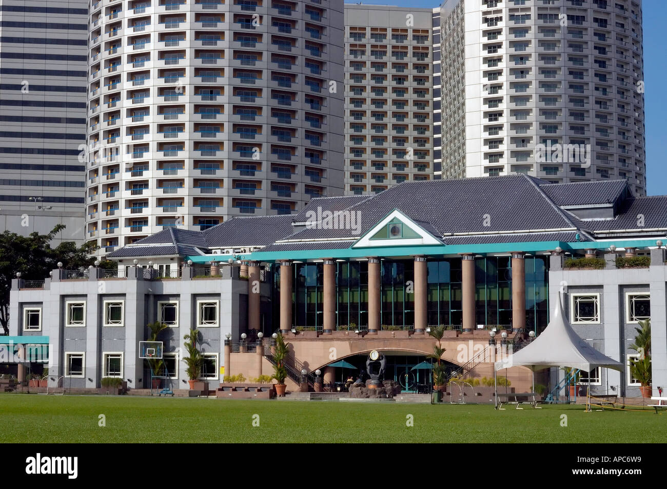 Scene of a modern downtown recreation clubhouse with tall skyscraper ...