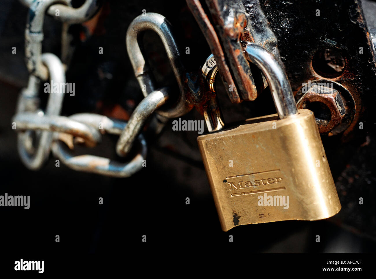 Master Lock on Chain Stock Photo - Alamy