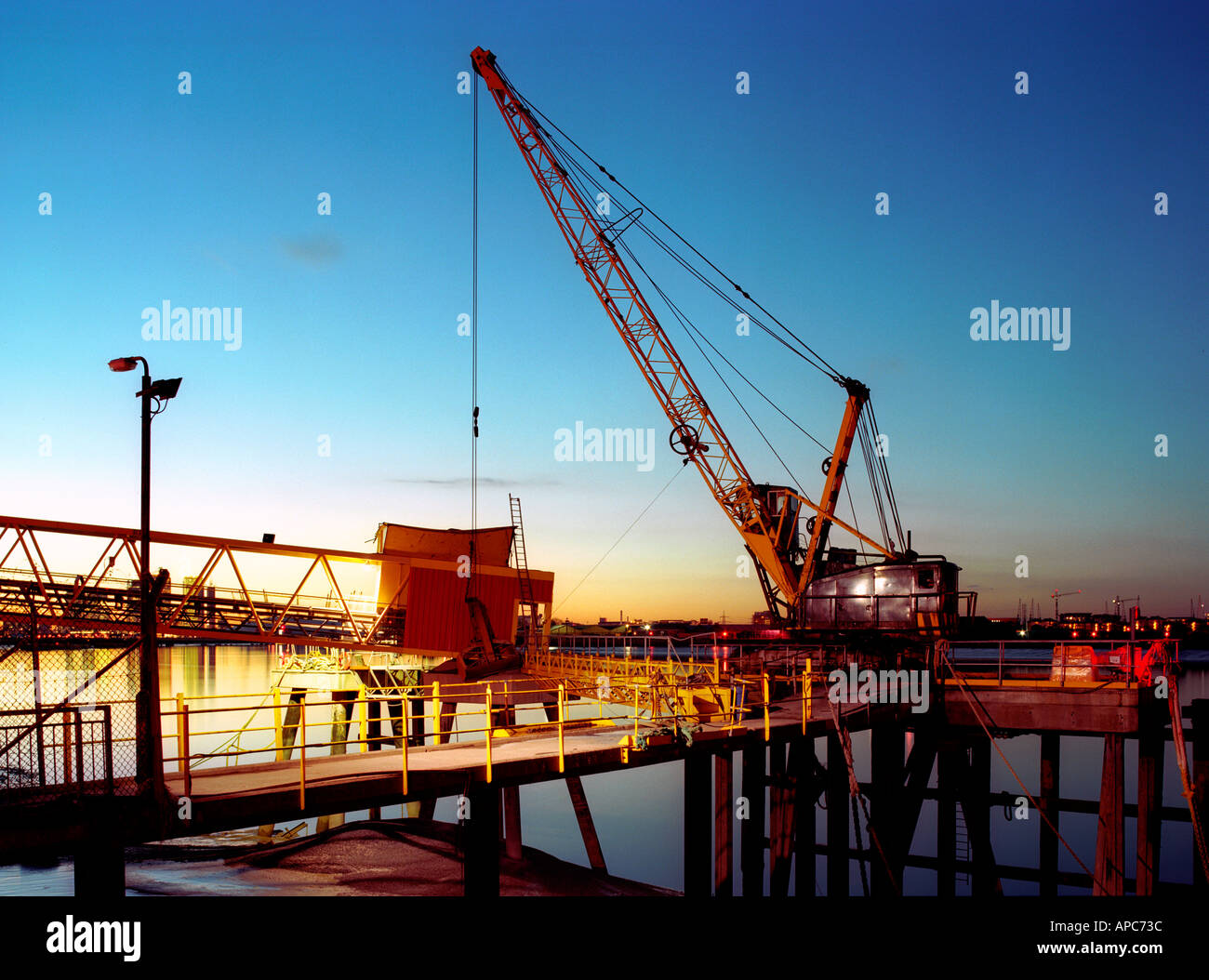 industry ;night; river; thames; greenwich; crane; boats;factory ...
