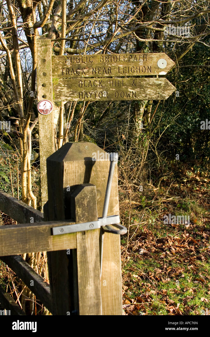 Wooden signpost pointing to Black Hill & Haytor, Dartmoor, Devon ...