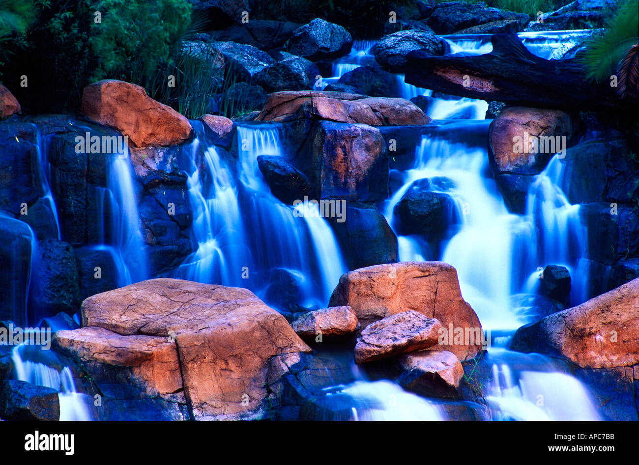 waterfall dusk sun city palace hotel south africa Stock Photo - Alamy
