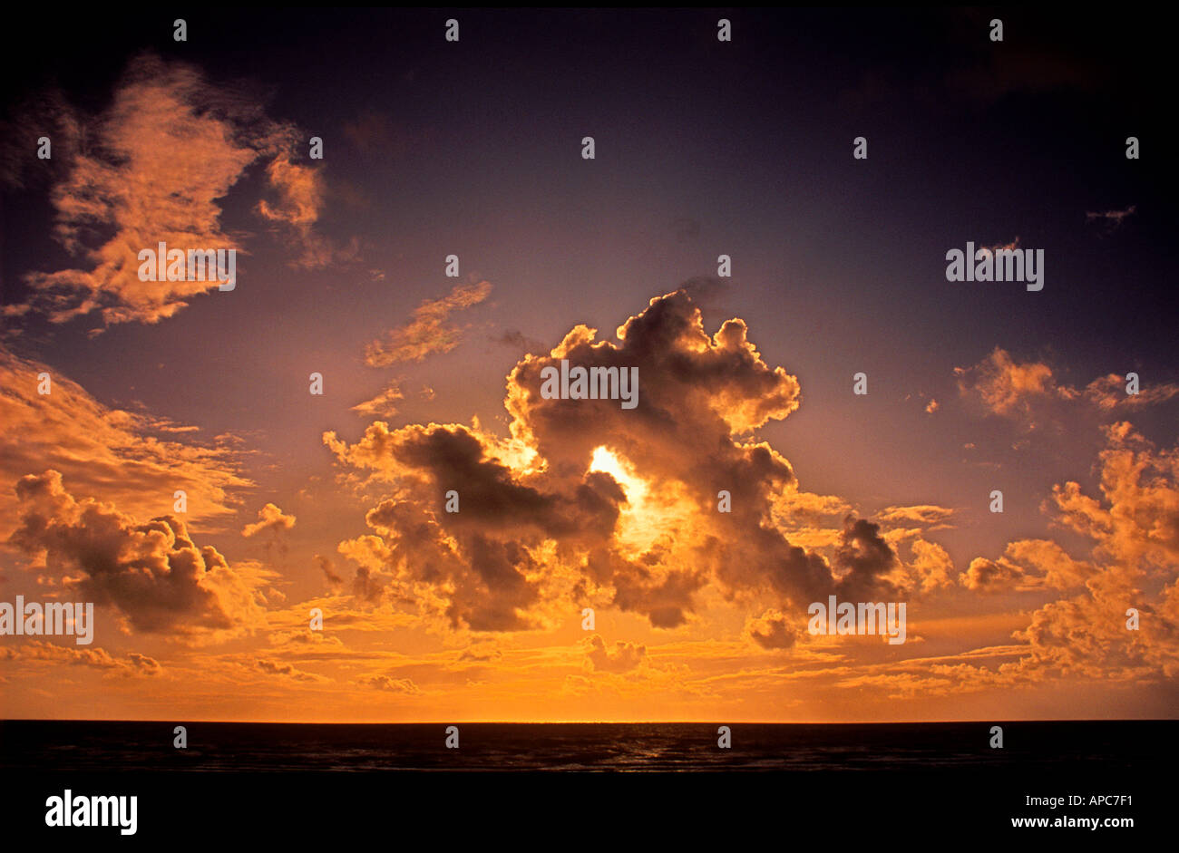 sunset dramatic clouds Stock Photo - Alamy