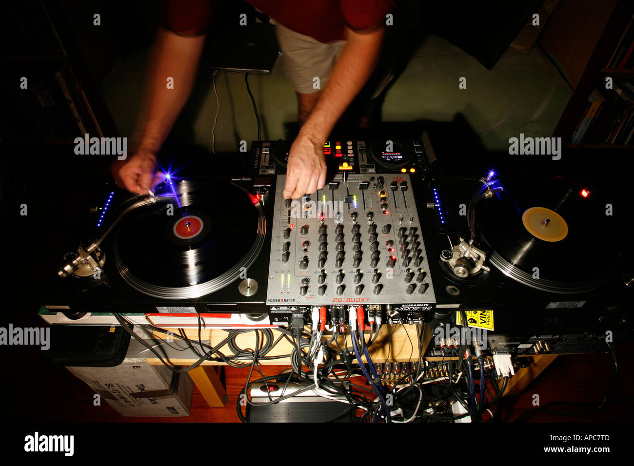 DJ spinning a vinyl record Stock Photo - Alamy