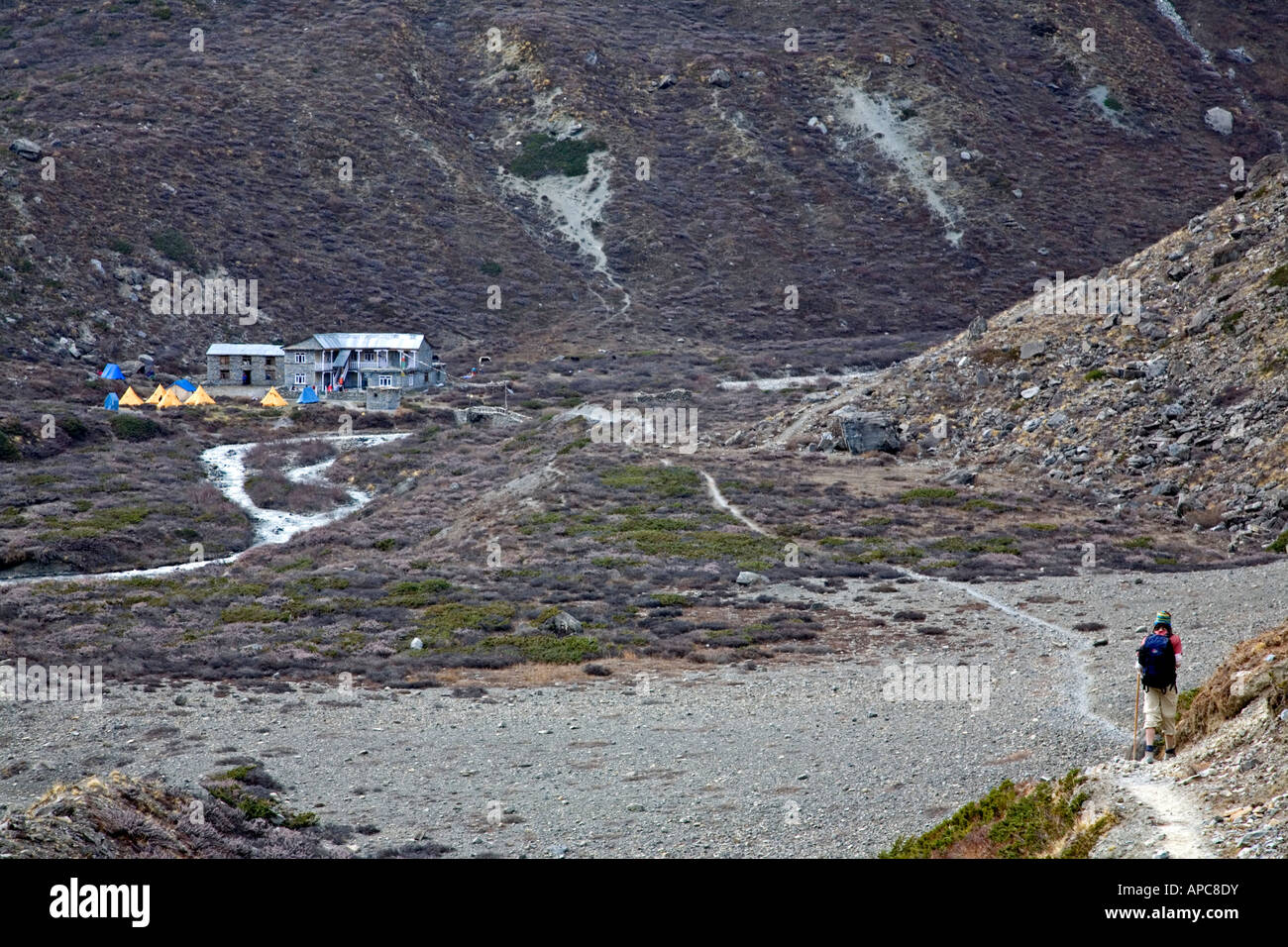 Trekker approaching to Tilicho basecamp hotel. On the way to Tilicho ...