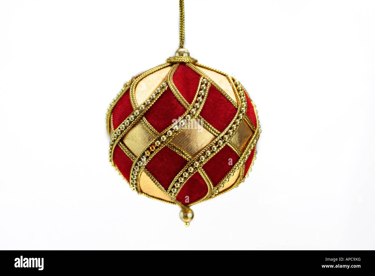 Large round red and gold hanging Christmas bauble Stock Photo - Alamy