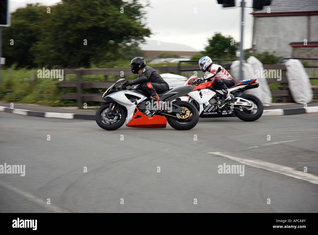 Racing on Southern 100 race course at Castletown corner Stock Photo - Alamy