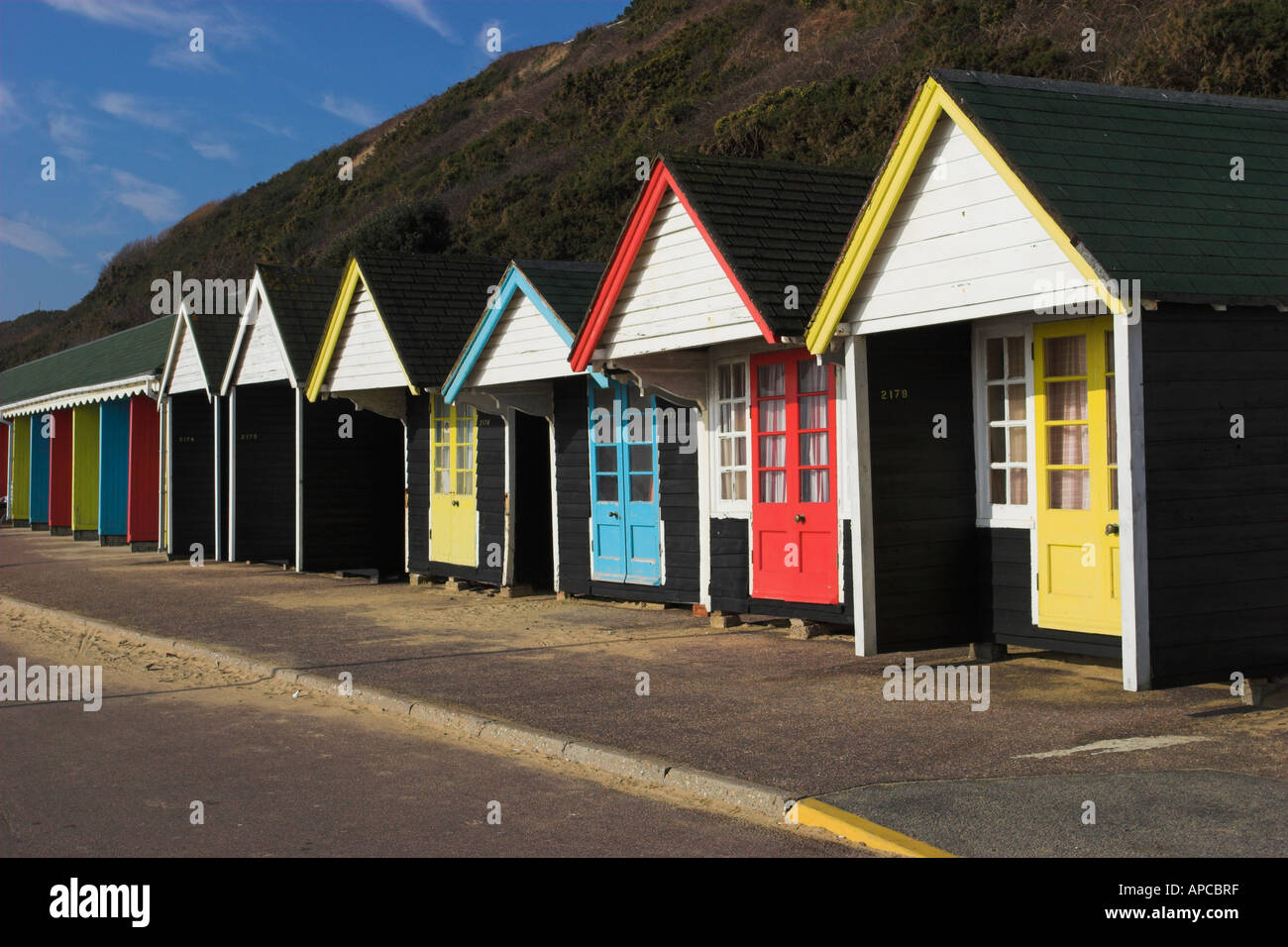 A line of colourful beach huts on Bournemouth sea front Stock Photo - Alamy