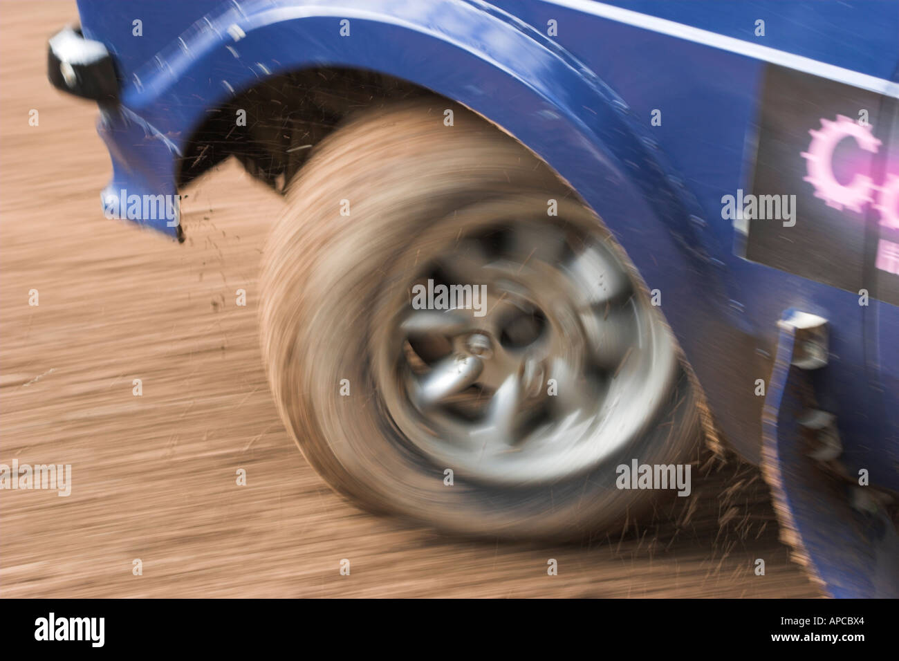 Car front wheel at speed hi-res stock photography and images - Alamy