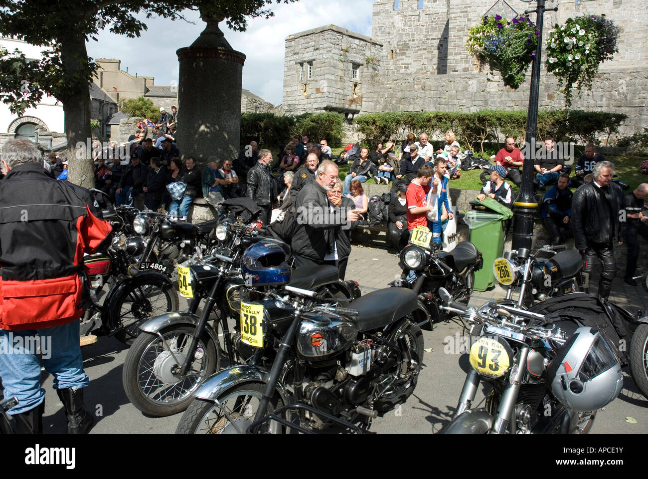 Crowds of bikes at vintage motor cycle rally in Castletown square Stock ...