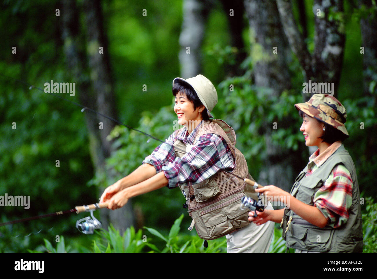 Japanese woman fishing hi-res stock photography and images - Alamy