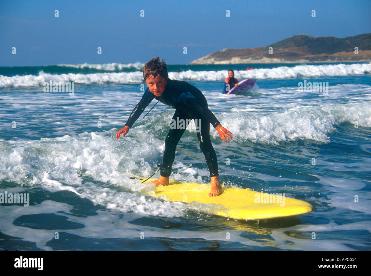 Children at surfing school Stock Photo - Alamy