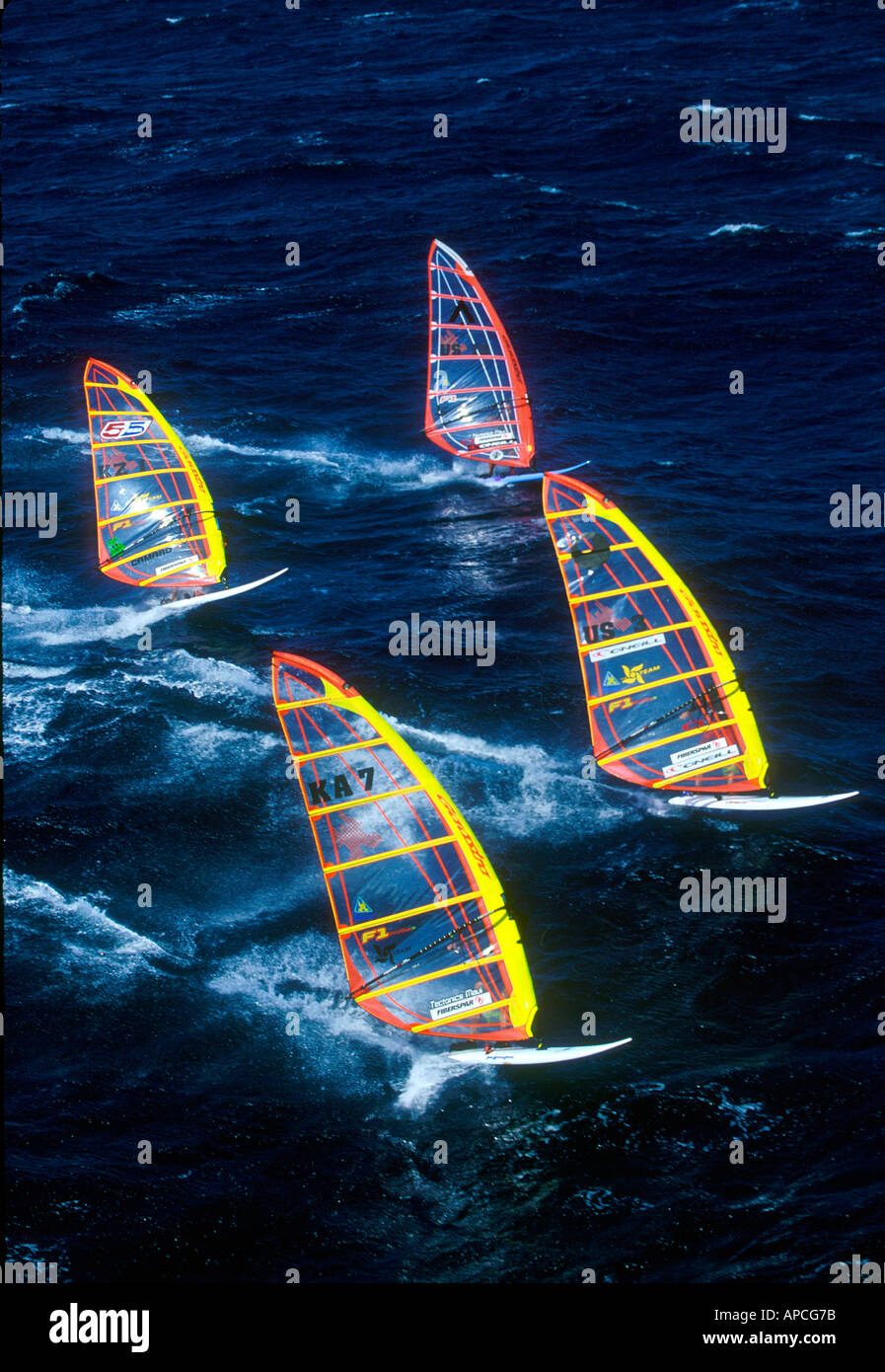 Windfsurfing sails at sea Stock Photo - Alamy