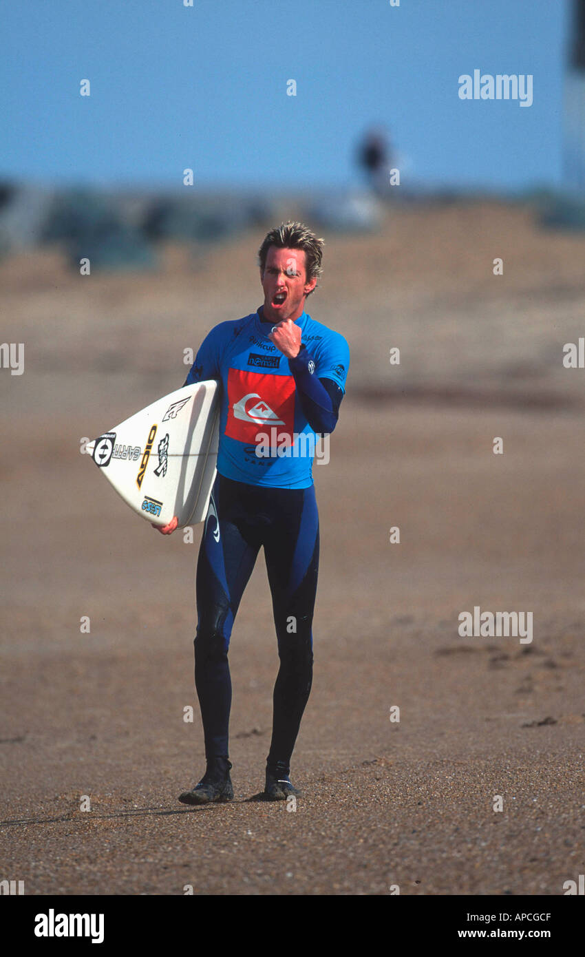 Bill Brian celebrates after the surfing at the Quik Cup France 2001 ...