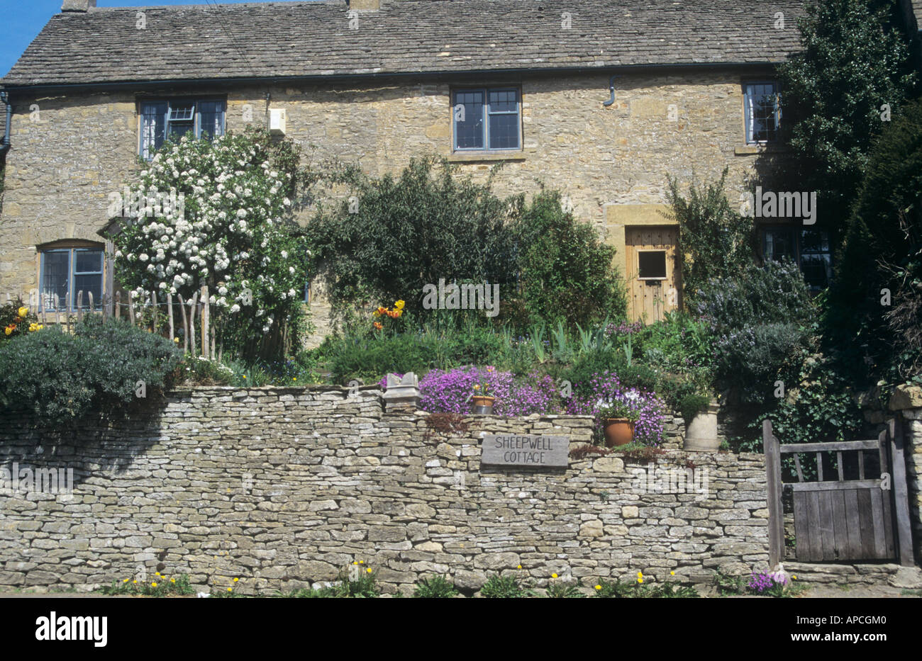 Typical Cotswold Stone Cottage at Naunton, near Stow-on-the-Wold, the ...