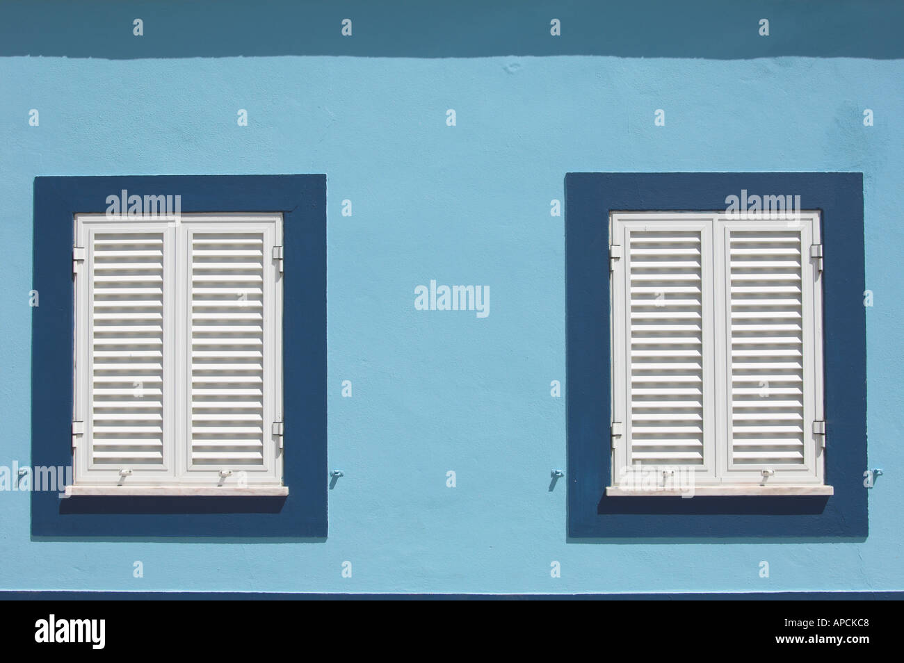 Blue house windows hi-res stock photography and images - Alamy