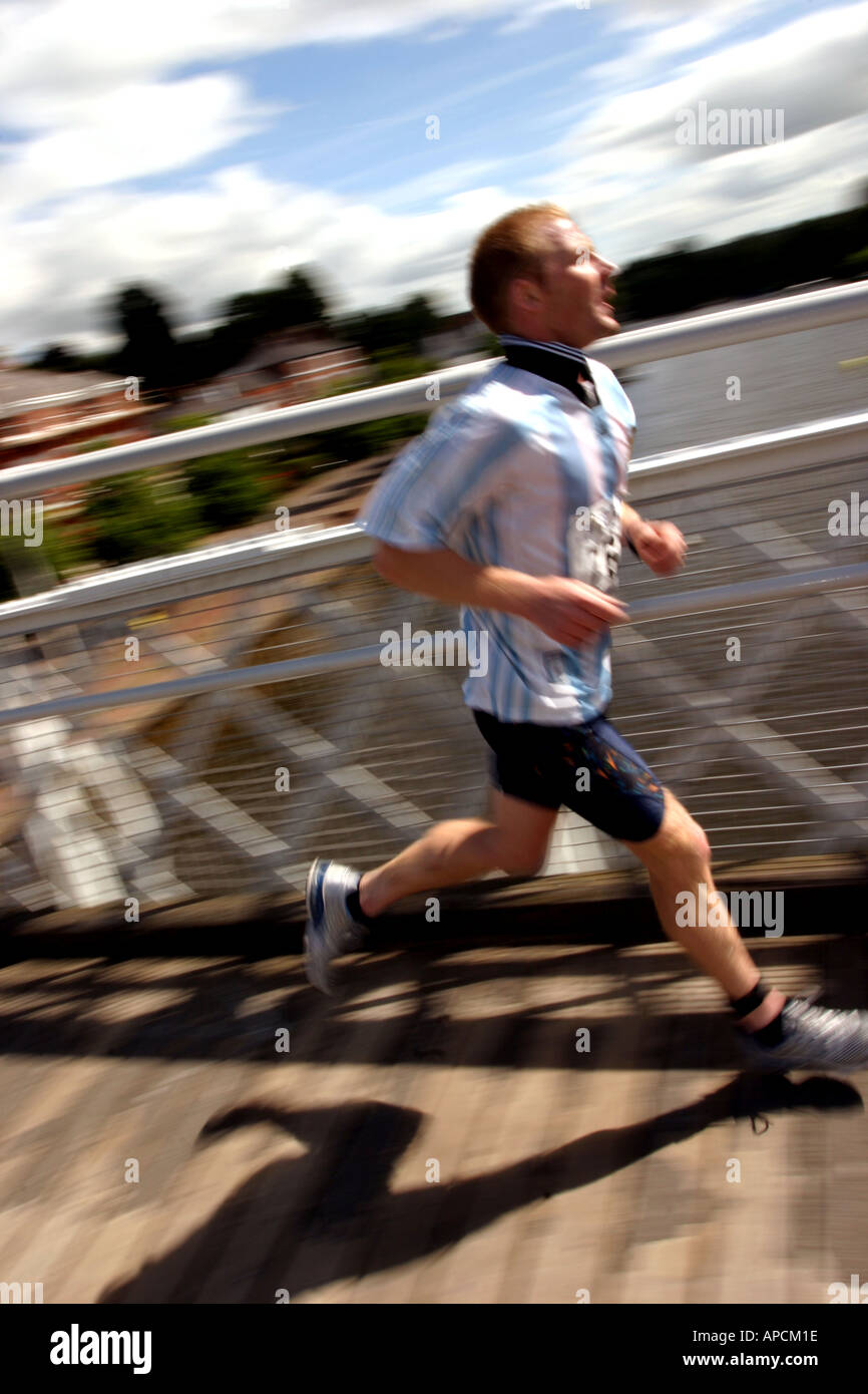 Male runner competing in a race Stock Photo - Alamy