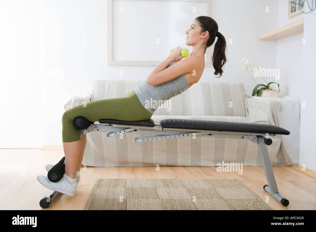 woman exercising at home Stock Photo - Alamy