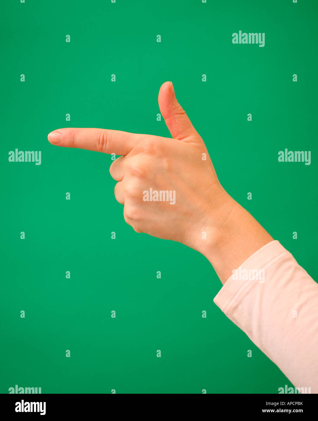 Woman pointing finger Stock Photo - Alamy