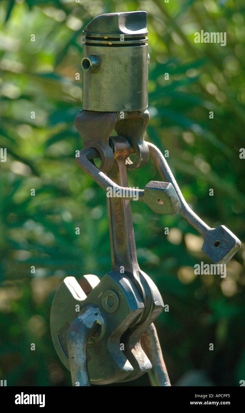 Sculpture of a man made from scrap engine parts Stock Photo - Alamy
