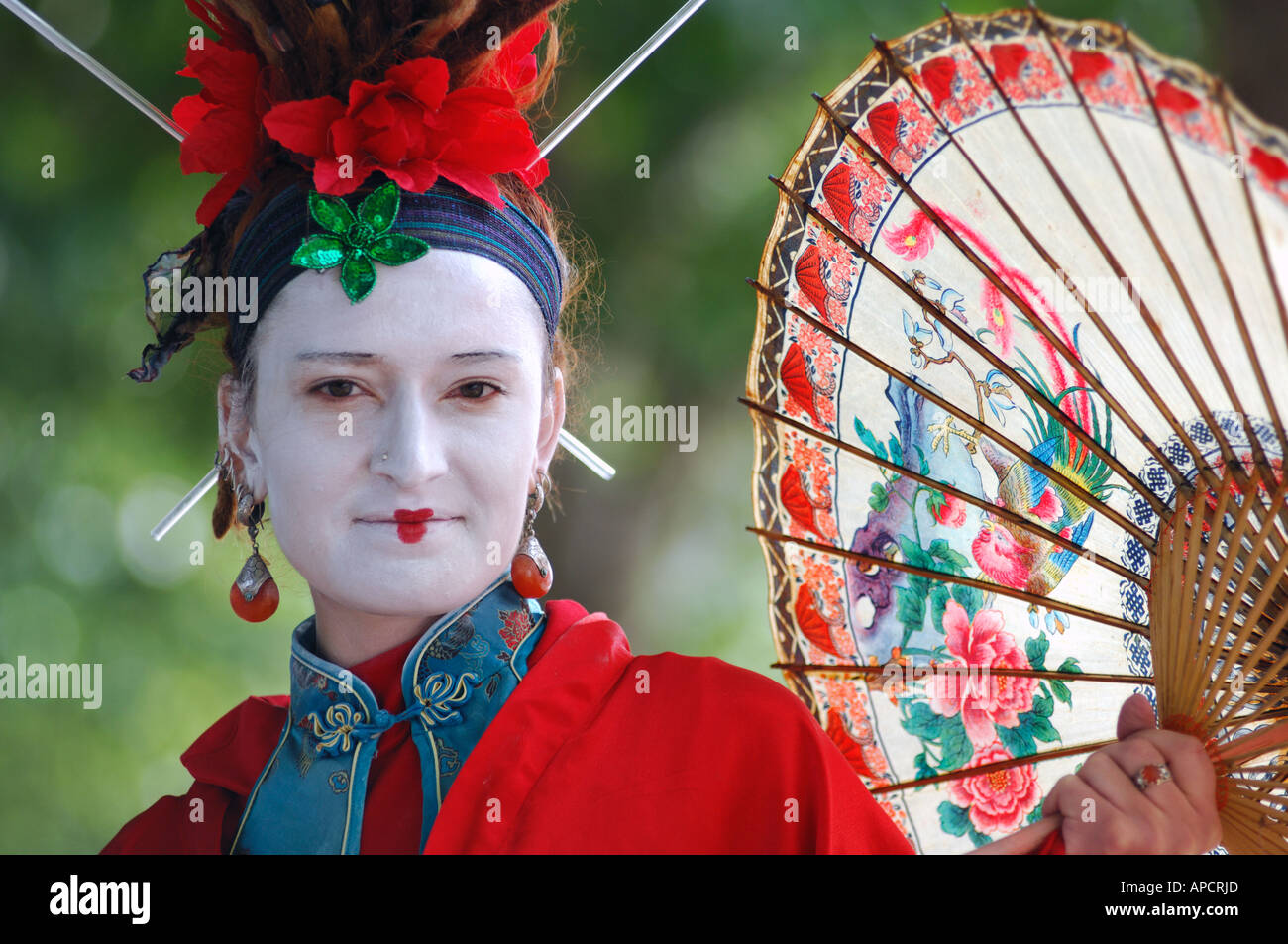 geisha / maiko girl made up street performer on the south bank of the ...