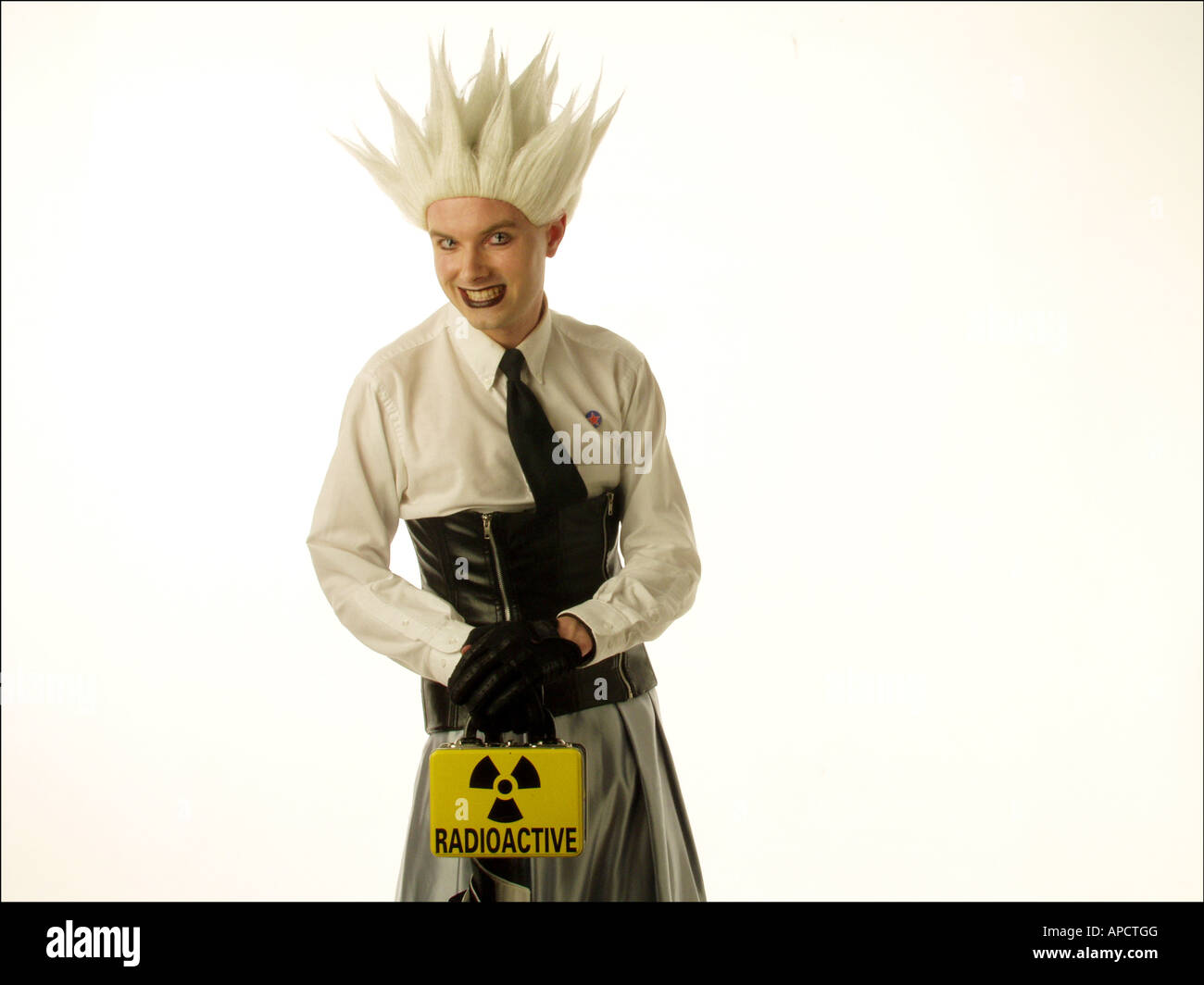 Man in artsy costume, wig and corset Stock Photo - Alamy