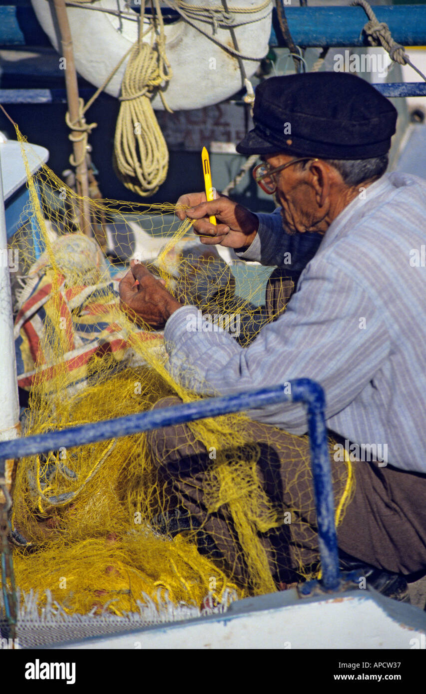 Mending fishing nets crete hi-res stock photography and images - Alamy