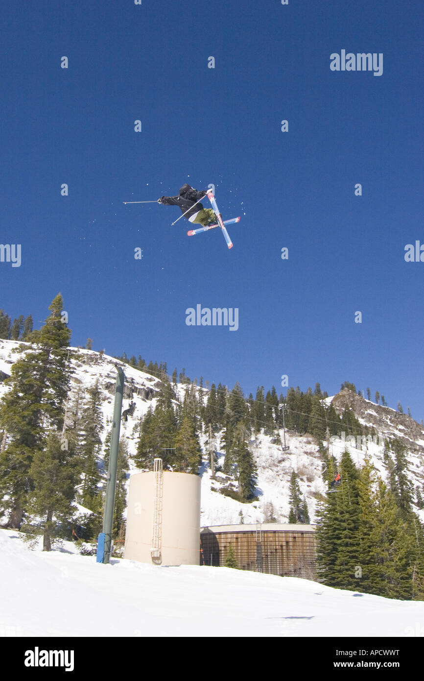 A skier jumping off a huge jump at Alpine Meadows in California Stock ...