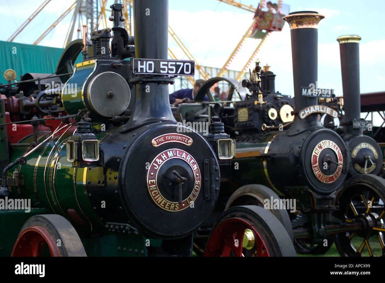 Steam engines in a row at the fairground Stock Photo - Alamy
