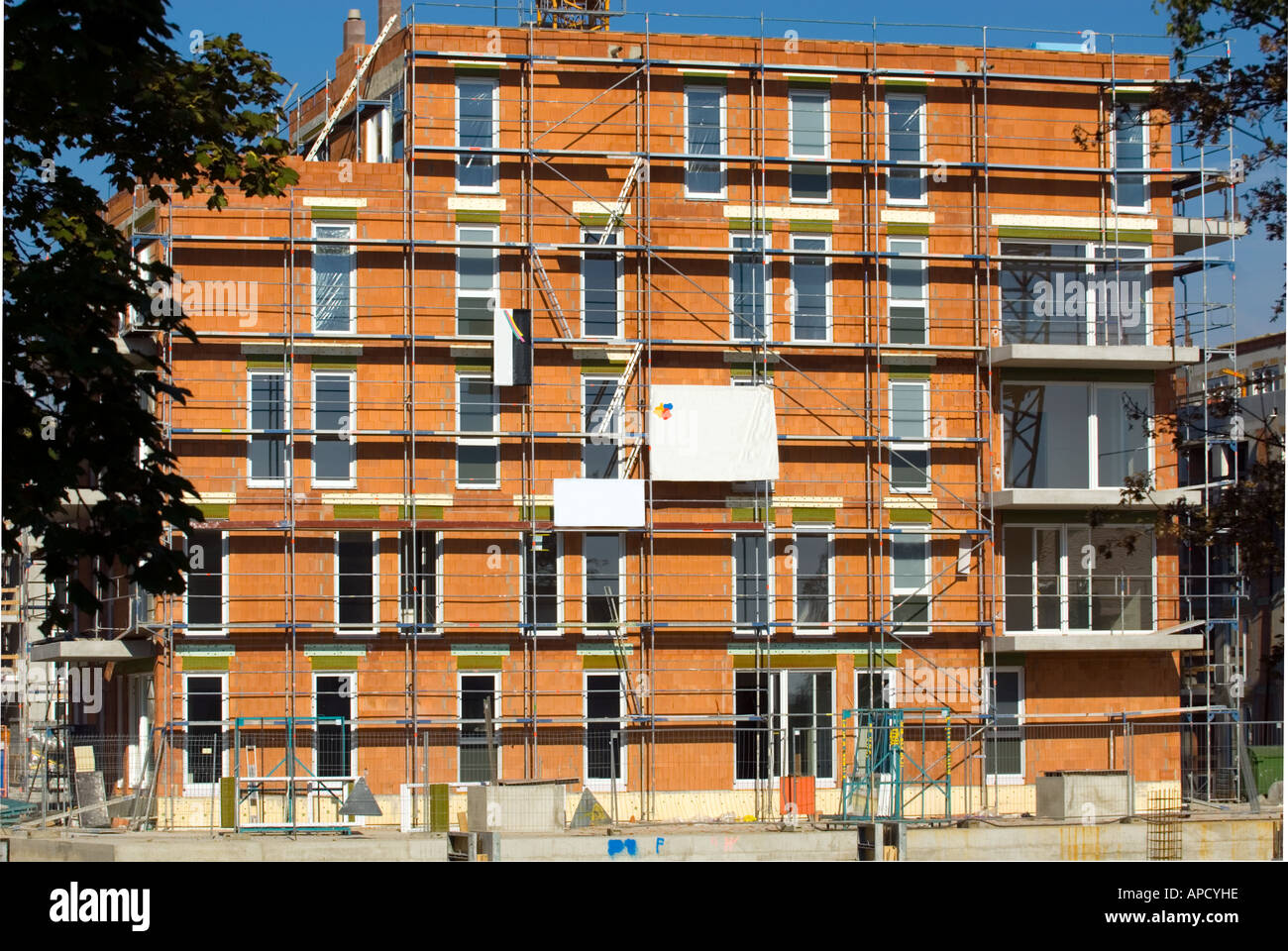 Construction site brick wall cement gray concrete men man at work house ...