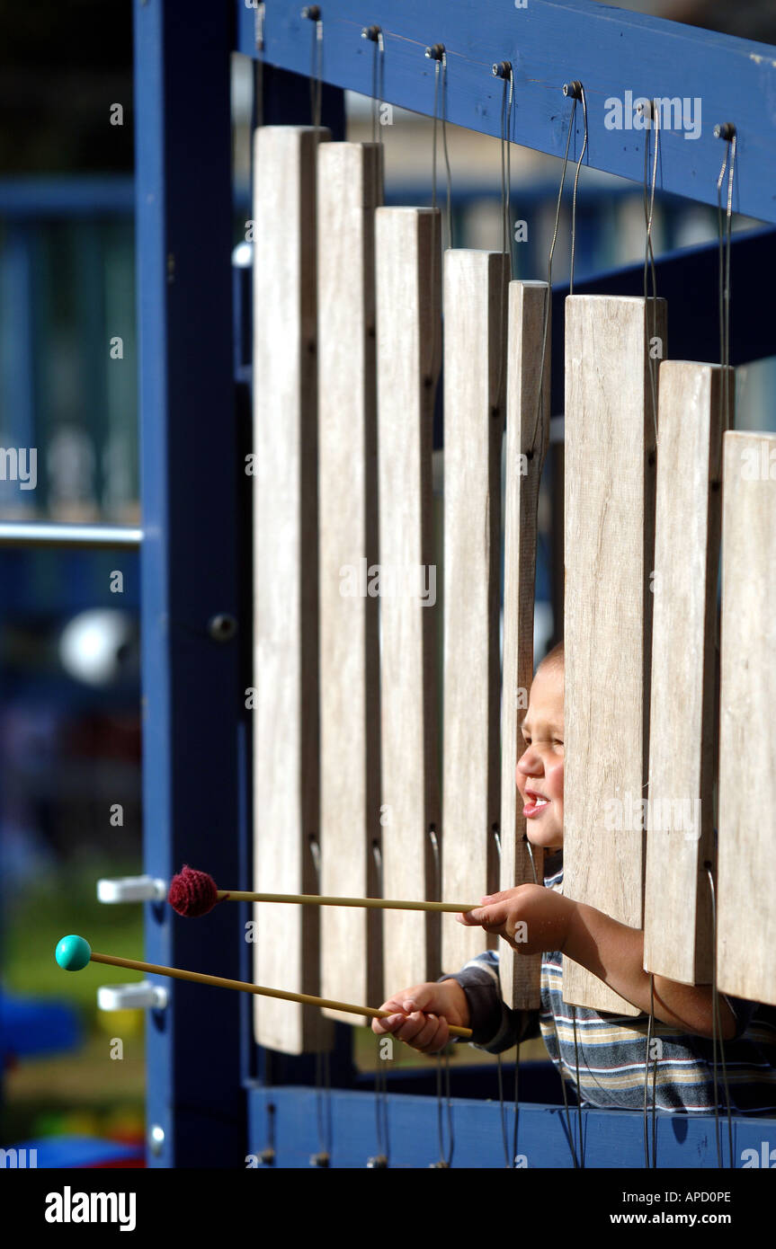Children playing playground faces hi-res stock photography and images ...