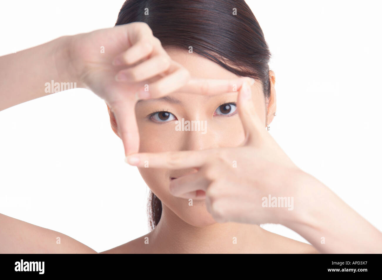 Young girl forming rectangle with fingers Stock Photo - Alamy