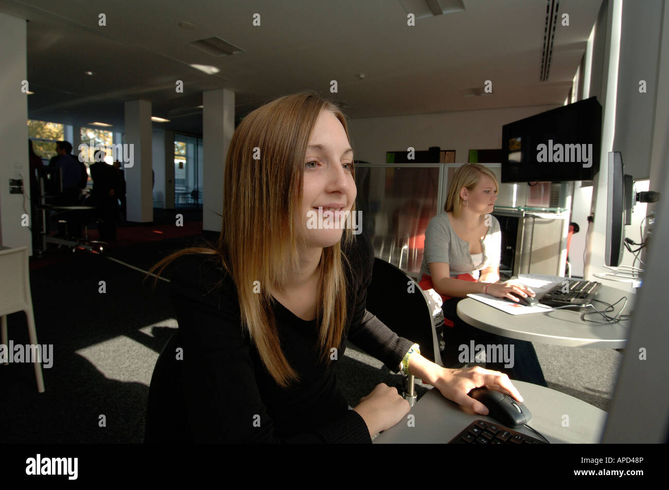students finishing off an assignment check their work at Brookes ...