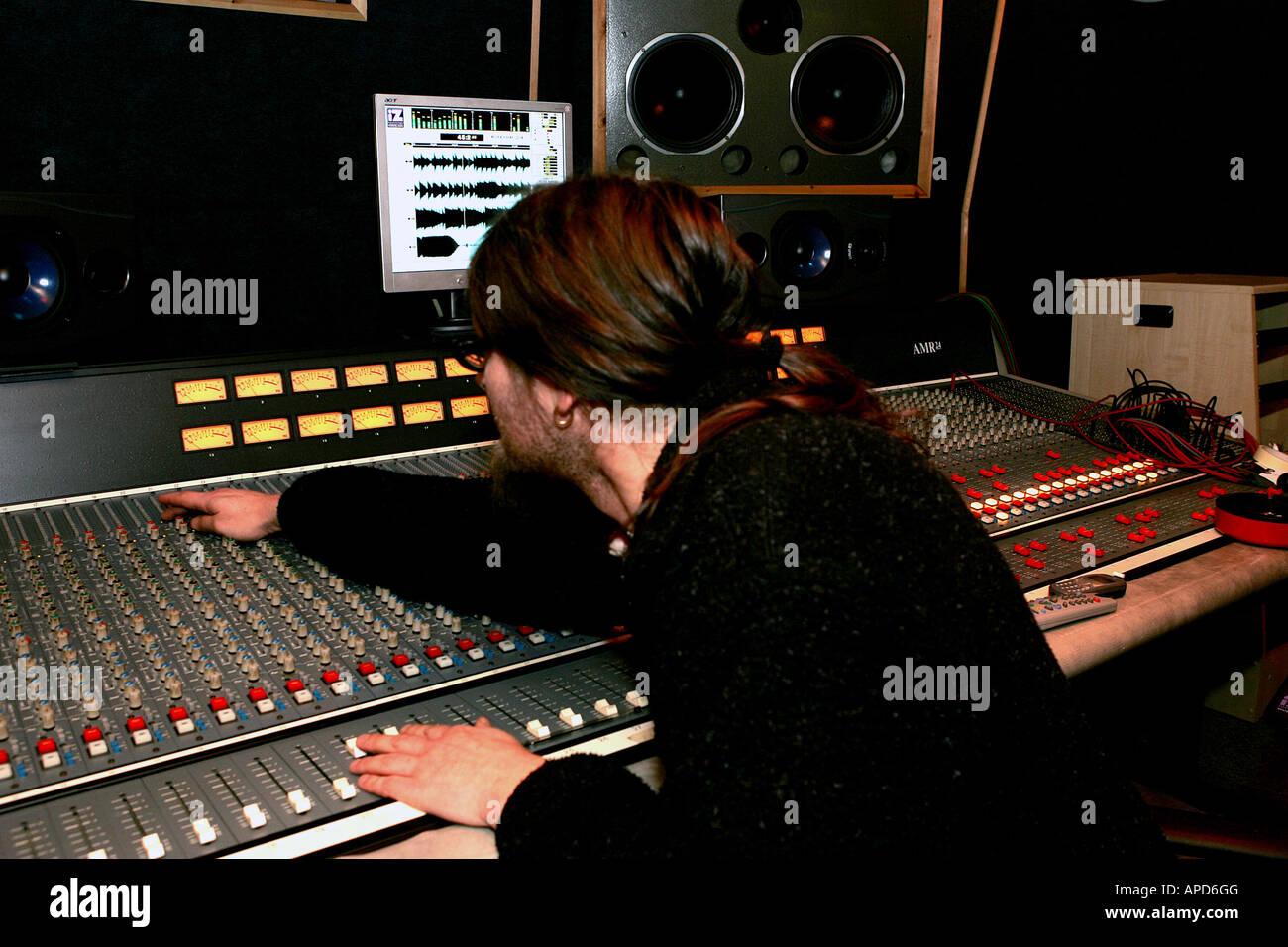 Sound Technician Using A Mixing desk Stock Photo - Alamy