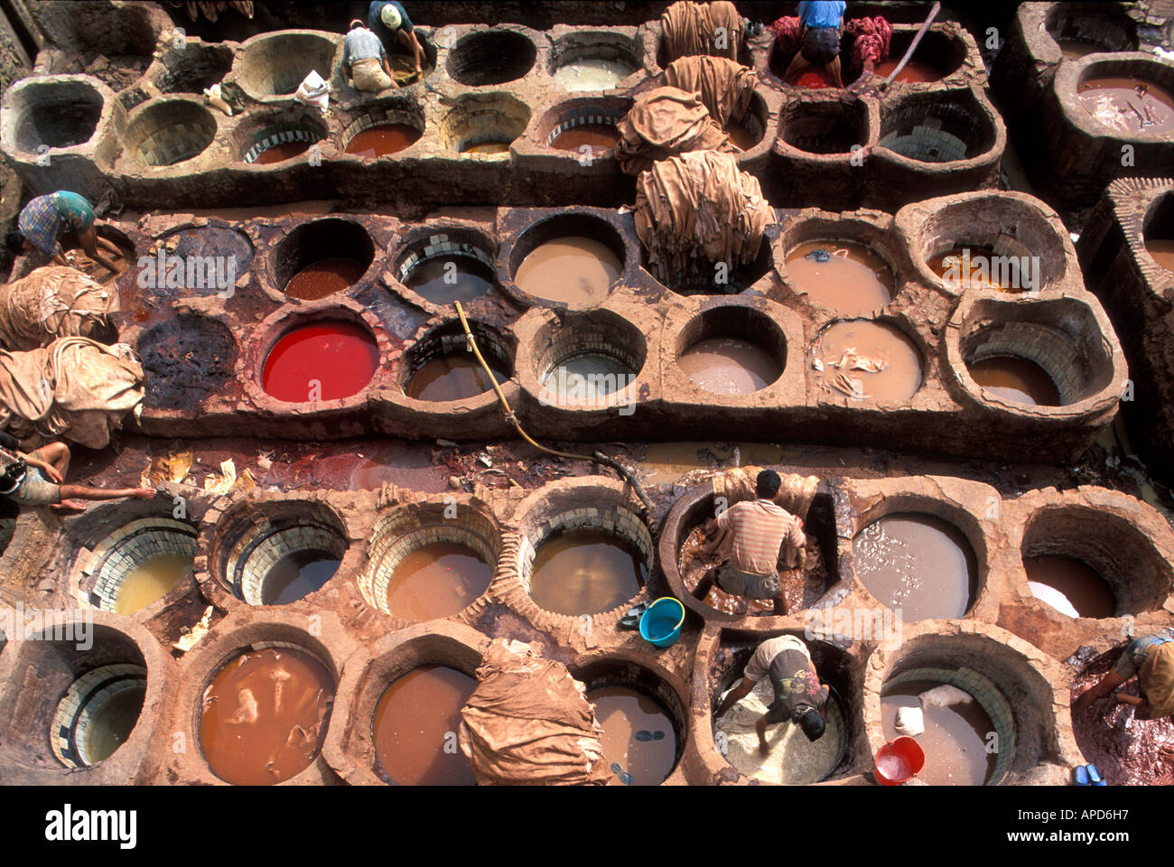 Africa Morocco Workers color cow hides in ancient die pits at leather ...