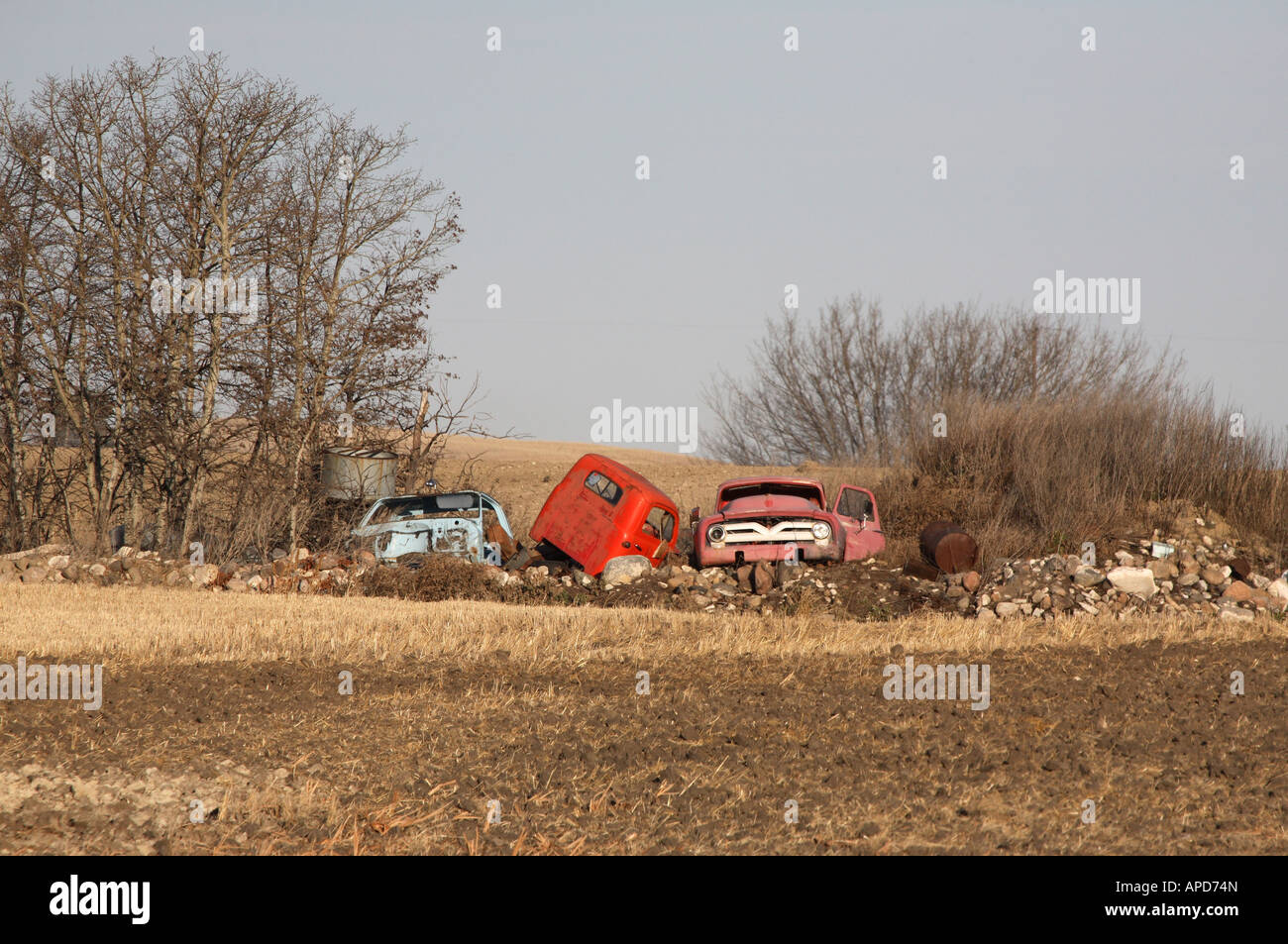Discarded farm junk Stock Photo - Alamy