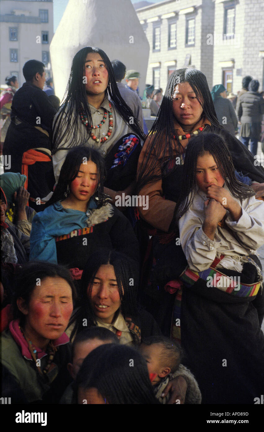 Johkang Square, Pilgrim women and men from Amdo province in traditional ...