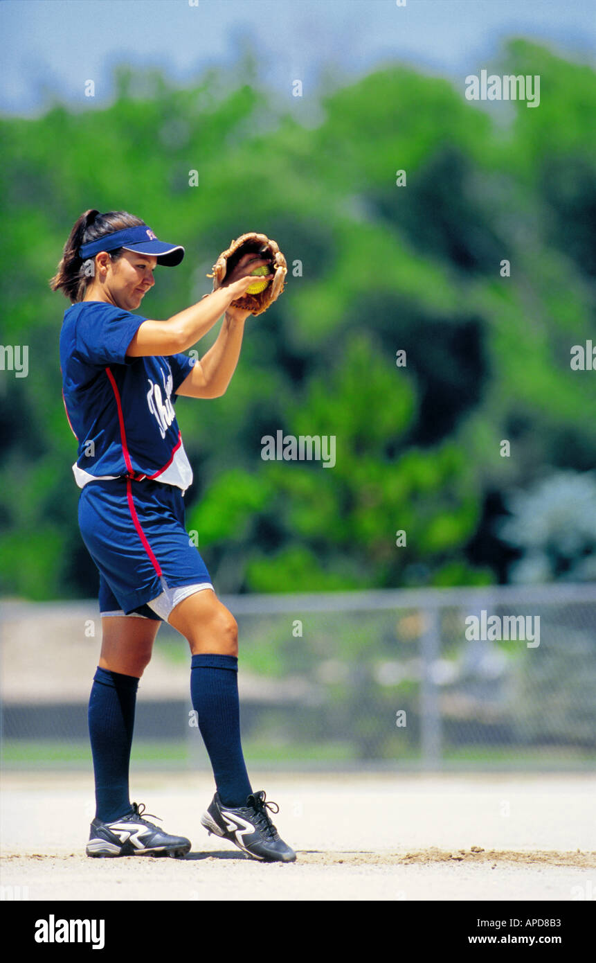 Playing softball vertical hi-res stock photography and images - Alamy