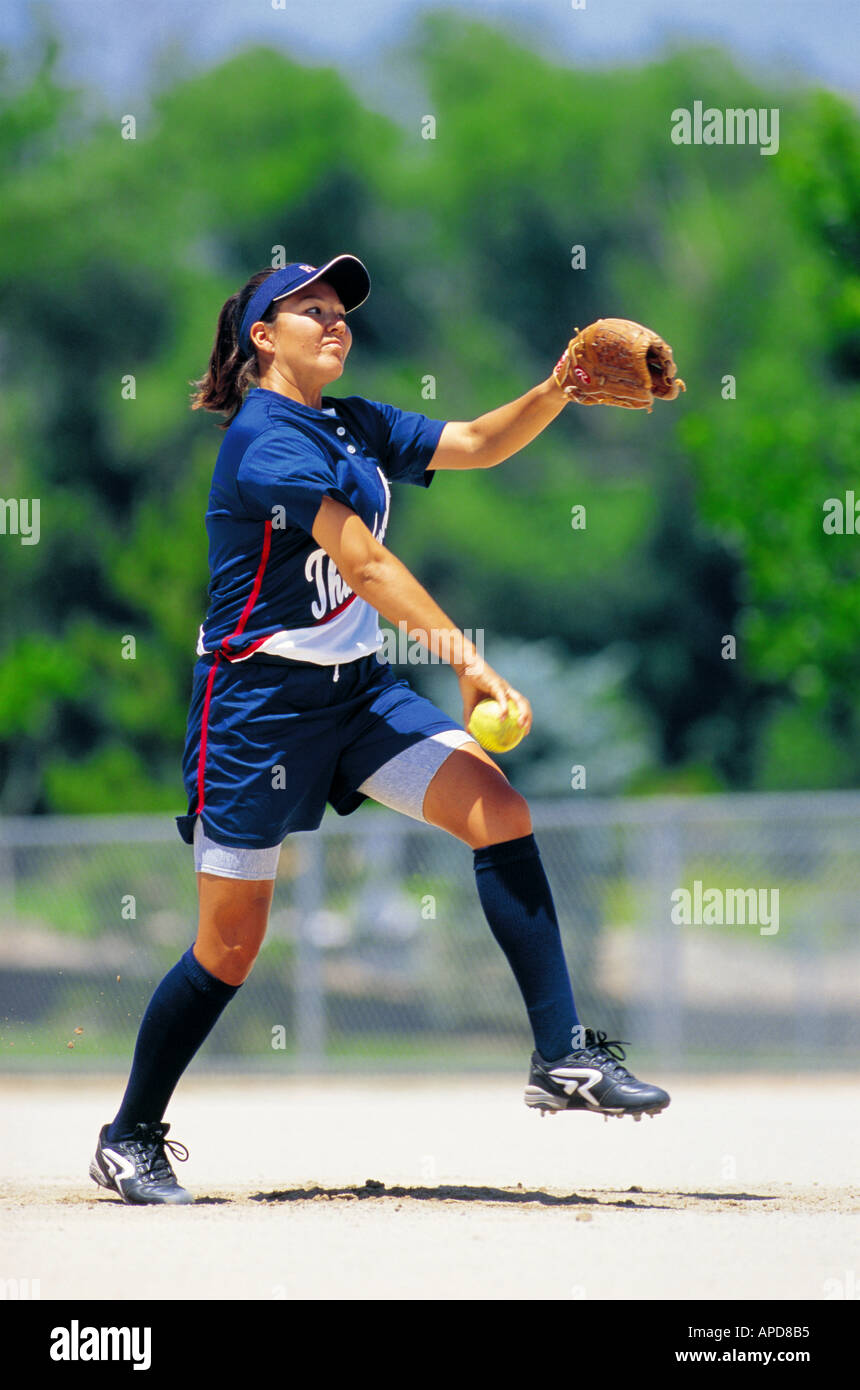 Playing softball vertical hi-res stock photography and images - Alamy