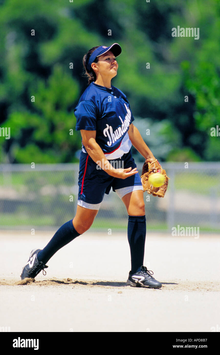 Playing softball vertical hi-res stock photography and images - Alamy