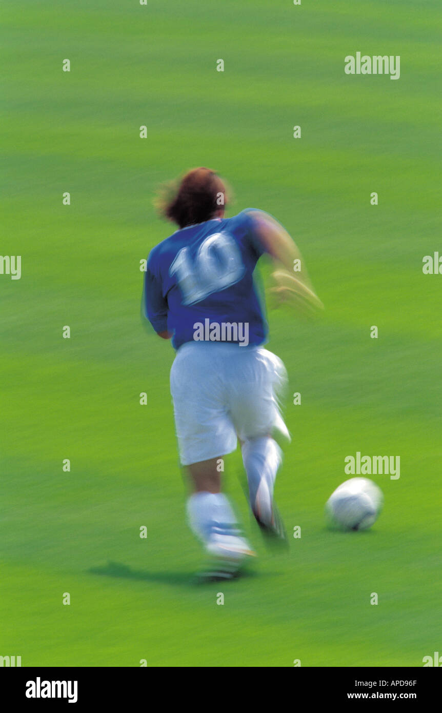 Professional football chasing ball hi-res stock photography and images ...