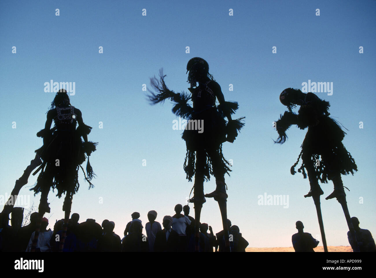 Stilt dancers in masquerade Dogon village Mali Stock Photo - Alamy