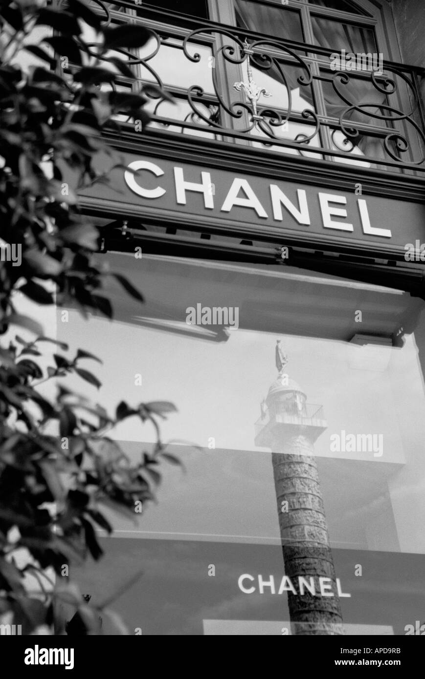 Place Vendome Square through reflection of Chanel shop window Paris ...